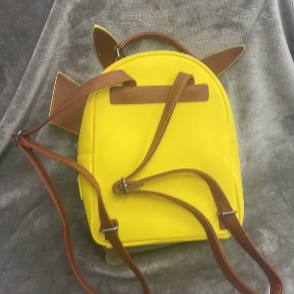 Loungefly | Bags | Loungefly Pokemon Pikachu Yellow Backpack Brand New ...